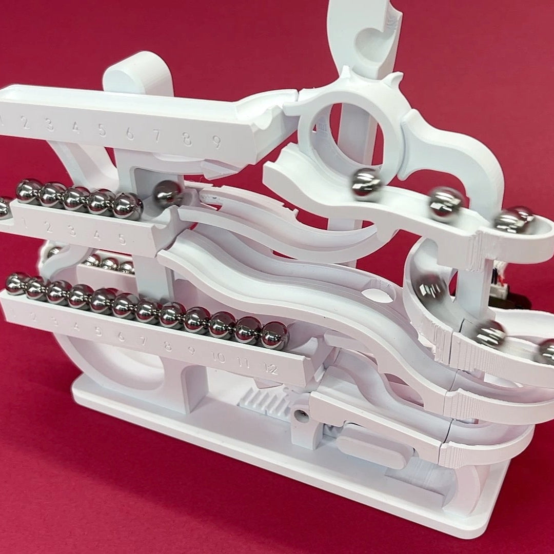 The Tipping Marble Clock – Engineezy